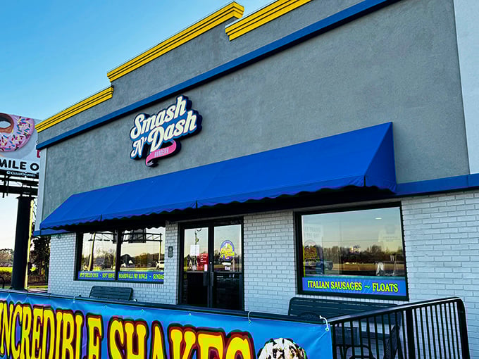 Smash N' Dash's bright blue awning stands out like a delicious oasis on the highway. Burger paradise awaits!