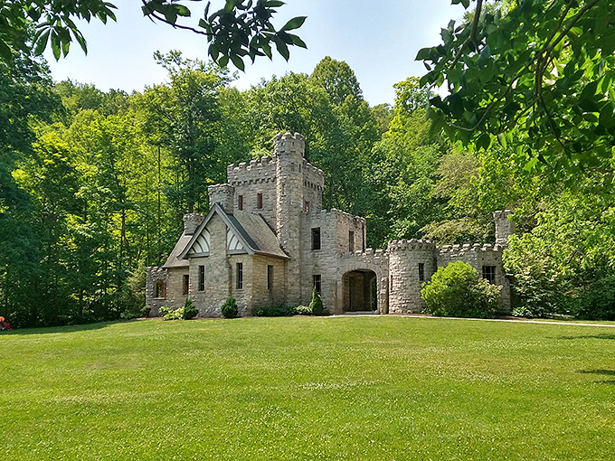 Nestled in the woods like a fairy tale surprise. This stone gatehouse whispers stories of what might have been.