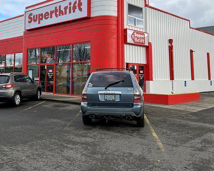 SuperThrift's bold red exterior stands out like a bullseye for bargain hunters, promising adventures in affordable treasure hunting.