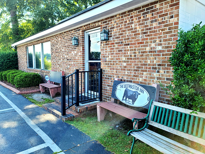 The Beefmastor Inn doesn't waste time on fancy facades. This brick building houses a carnivore's paradise where simplicity reigns supreme.