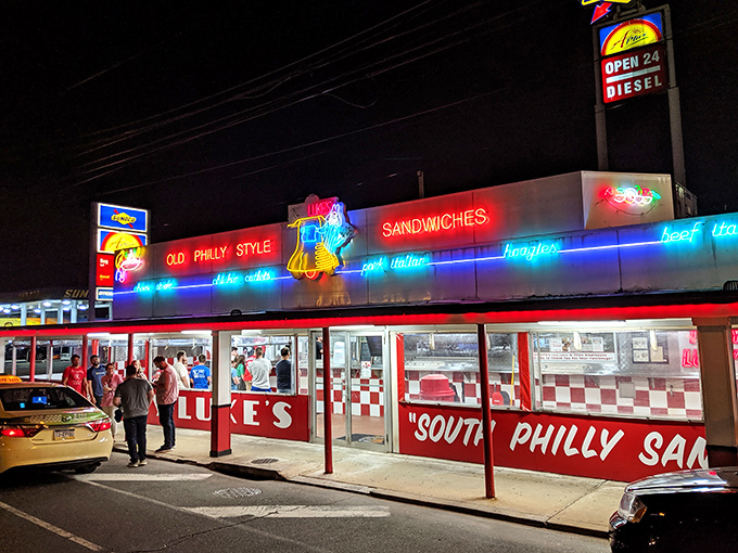 Tony & Nick's lights up the night with neon promises of "Old Philly Style" deliciousness. This red-checkered wonderland is where cheesesteak dreams come true.