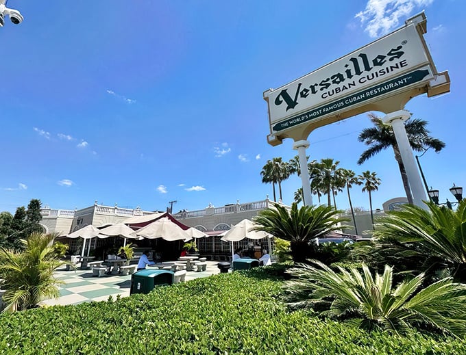 Versailles Restaurant's iconic sign stands tall against the Miami sky, a beacon for Cuban food lovers everywhere.