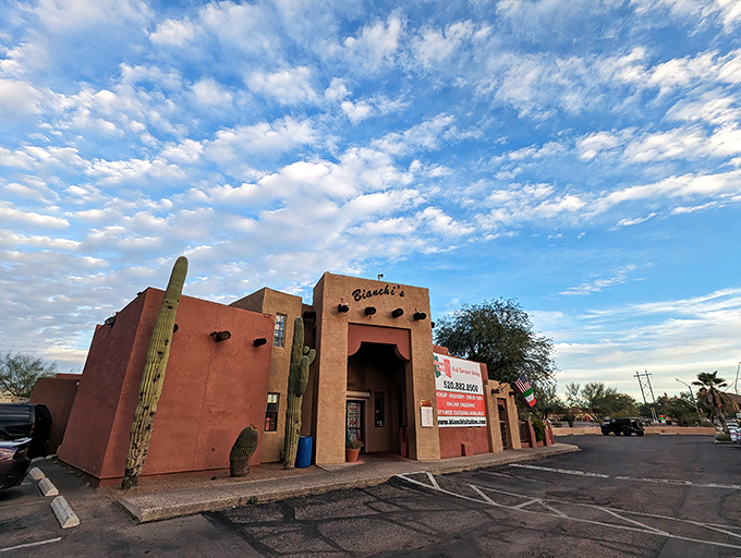 Saguaro cacti stand guard outside Bianchi's, a pizza oasis where East Coast flavors thrive in the Sonoran Desert.