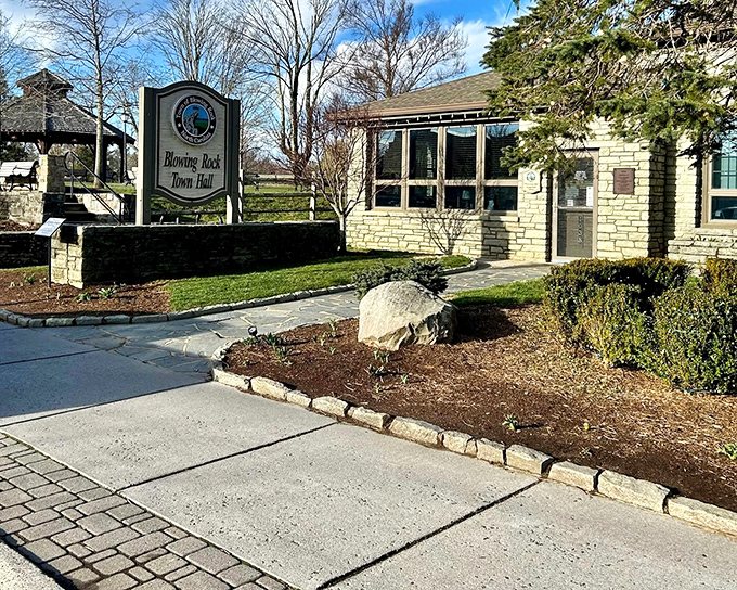 Stone and greenery frame Blowing Rock's Town Hall, where even official business feels like a day in the garden.