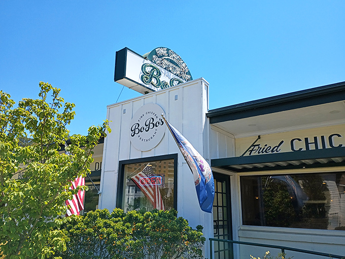 Flying both American and Virginia flags proudly, but the real patriotism is in their perfectly golden chicken.