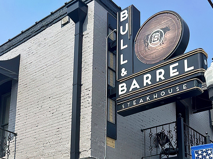 The bold sign announces what matters most at Bull and Barrel—this is steak territory, plain and simple.