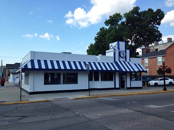 That classic diner silhouette against a blue Ohio sky. The motorcycle out front suggests even road warriors know where to find good eggs.