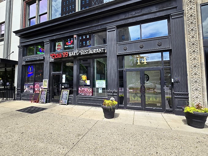 Behind those city windows lies a seafood paradise where bibs aren't just suggested &ndash; they're practically mandatory!