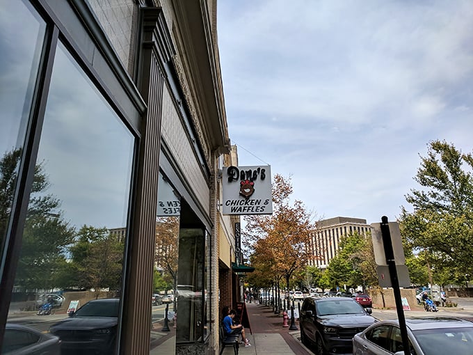 Morning light catches Dame's iconic sign &ndash; a promise of chicken and waffle matrimony that's converted more skeptics than a revival meeting.
