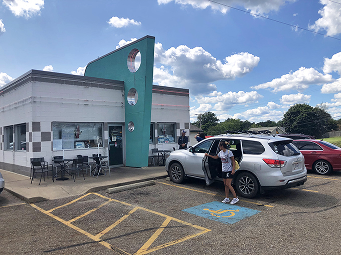 That teal accent wall at Doug's isn't just eye-catching&mdash;it's the architectural equivalent of "trust me, our burgers are worth it."