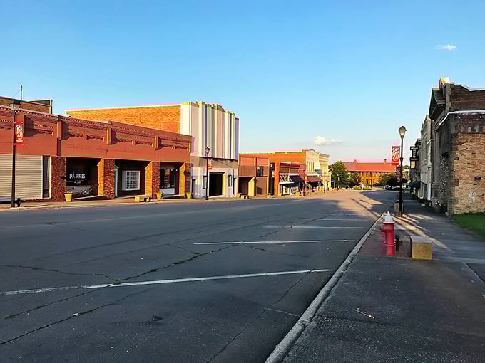 Sunlight bathes Hamlet's colorful storefronts, where your retirement dollars stretch as far as these welcoming sidewalks.