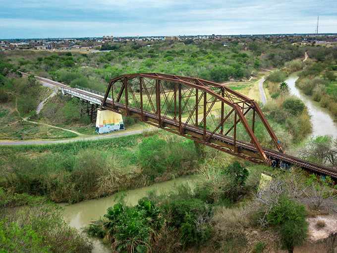 That rusty railroad bridge isn't just crossing water &ndash; it's connecting Harlingen's industrial past to its laid-back present.