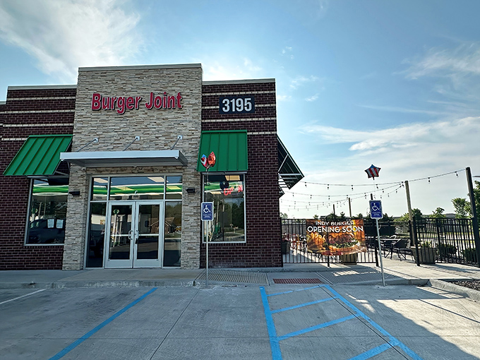 Green awnings and a straightforward sign – The Burger Joint doesn't need fancy tricks when the burgers speak for themselves.