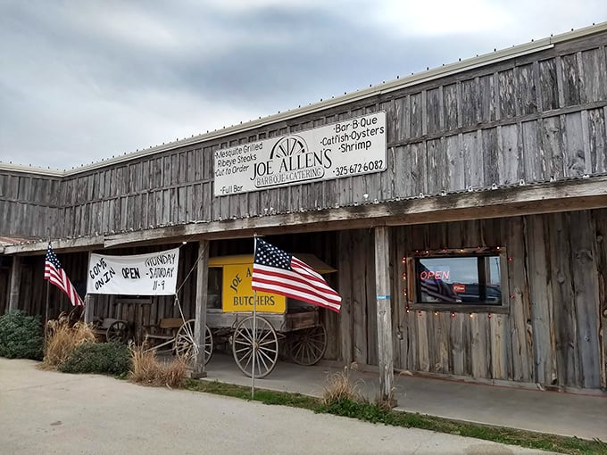 The American and Texas flags flutter outside Joe Allen's, where meat-lovers have been making pilgrimages for decades.