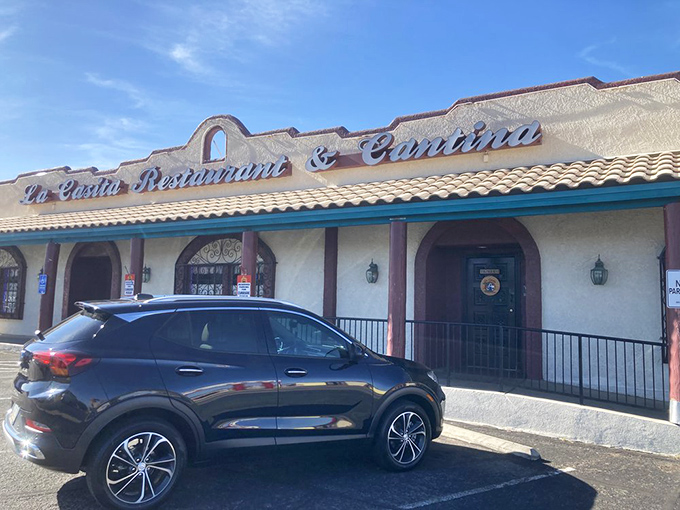 La Casita's name proudly displayed above welcoming arches. The kind of place where regulars have "their table" and servers know their order.