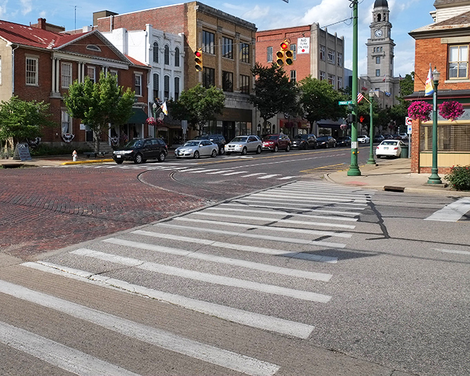 A downtown straight from a Norman Rockwell painting, where parallel parking hasn't changed since your grandparents' first date.