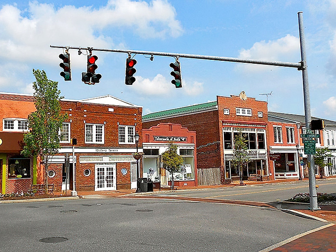Downtown Milford's crosswalks and classic streetlights create that Norman Rockwell vibe that makes retirement feel like a permanent vacation.