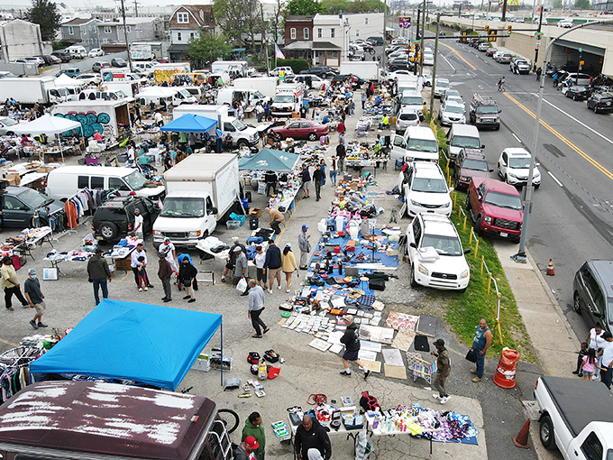 Like a small city of stuff! Vendors and shoppers create pathways through this massive marketplace where anything might be found.