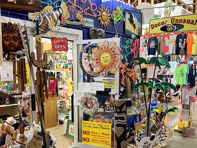Fashion finds galore! Red Barn shoppers browse racks of affordable clothing while mentally calculating how many outfits they can snag with their remaining budget.