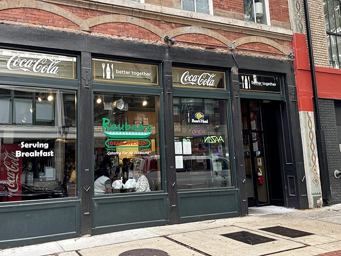 Behind these windows lies a world where corned beef is king and sandwich artistry reaches its highest form.