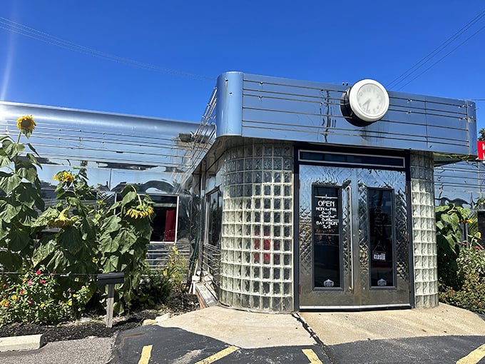 Glass blocks and chrome welcome morning light and hungry souls. This isn't just breakfast; it's architectural nostalgia served hot.