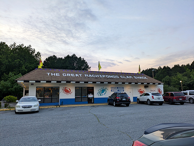 Sunset at the Clam Shack &ndash; where Eastern Shore magic happens. Those flags aren't just waving, they're beckoning seafood lovers.