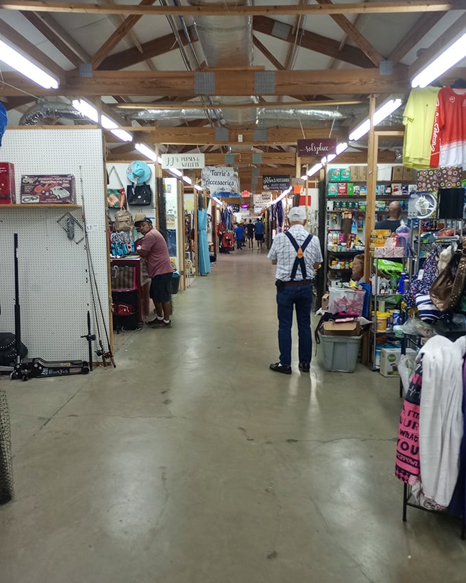 Where one person's extras become another's treasures. Shoppers explore the spacious indoor aisles at Tri-Cities Flea Market.
