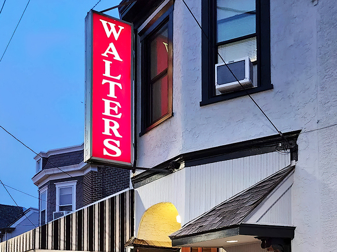 Twilight at Walter's &ndash; when the neon glows and the grill fires up. Steak o'clock is the best time of day.