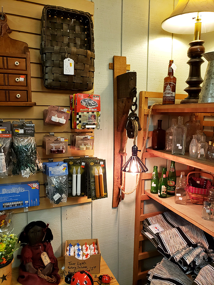 Every bottle tells a story. This corner of vintage glassware and rusty treasures could keep collectors happily hunting for hours.