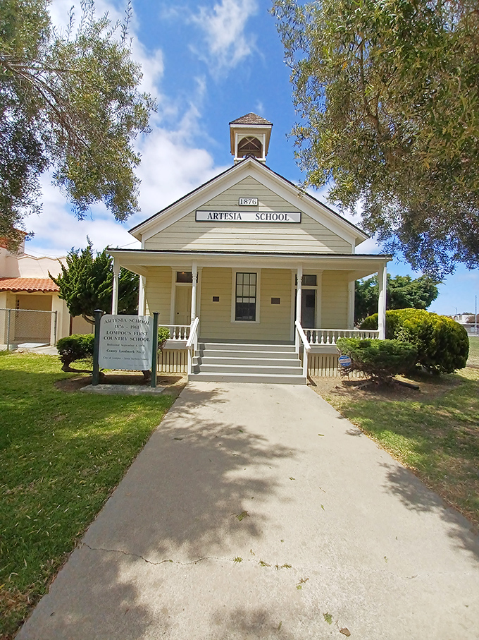 The Artesia Schoolhouse Museum stands as a perfectly preserved slice of early California education. This 1876 one-room schoolhouse offers a glimpse into simpler times.