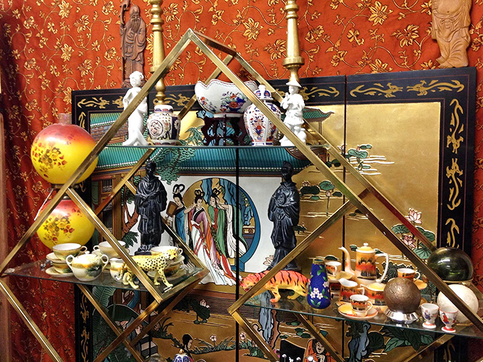 East meets Midwest in this dazzling Asian-inspired display. The brass geometric shelving creates a gallery-worthy showcase for cultural treasures.