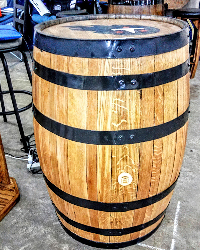 Nothing says "rustic charm" quite like a genuine whiskey barrel waiting for its next adventure.