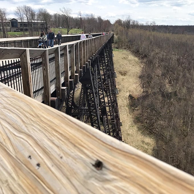 Walking this historic bridge feels like stepping into a postcard that someone forgot to mail to heaven.