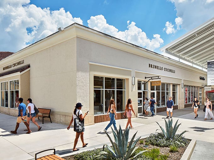Brunello Cucinelli's minimalist storefront offers a moment of Italian elegance amid the shopping frenzy&mdash;like finding a quiet caf&eacute; in Rome.