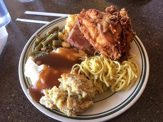 The holy trinity of comfort: golden fried chicken, buttery noodles, and green beans that definitely weren't strangers to bacon. A plate that grandma would approve of.