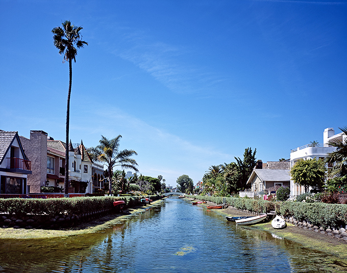 Tranquil canals lined with dream homes &ndash; Venice's quieter side offers a peaceful contrast to the boardwalk's cheerful chaos.