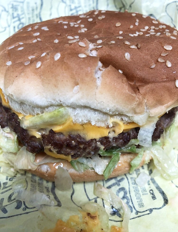 Behold the cheeseburger in its natural habitat &ndash; a perfect symphony of beef, cheese, and fresh toppings that puts fast food chains to shame.