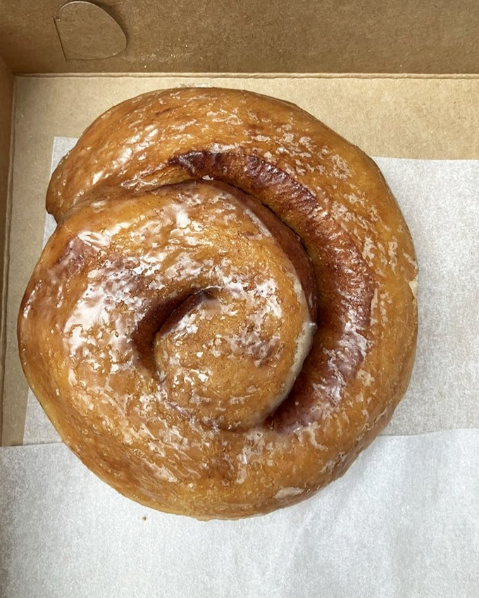 Behold the crown jewel: a cinnamon roll so perfect it could make a grown person weep tears of joy.