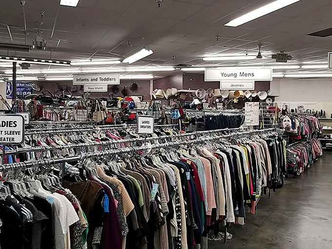 Fashion democracy in action: designer dreams mingle with everyday essentials in perfect thrift store harmony.