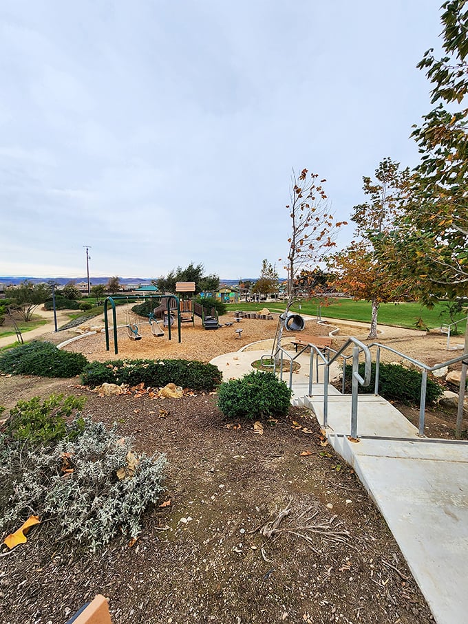 Childhood simplicity awaits at this community playground, where swings and slides promise adventures without needing a smartphone in sight.
