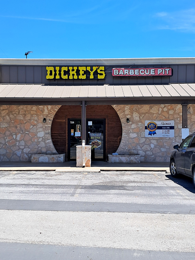 Dickey's Barbecue Pit stands ready to satisfy your smoked meat cravings. That stone exterior hints at the Texas tradition waiting inside.