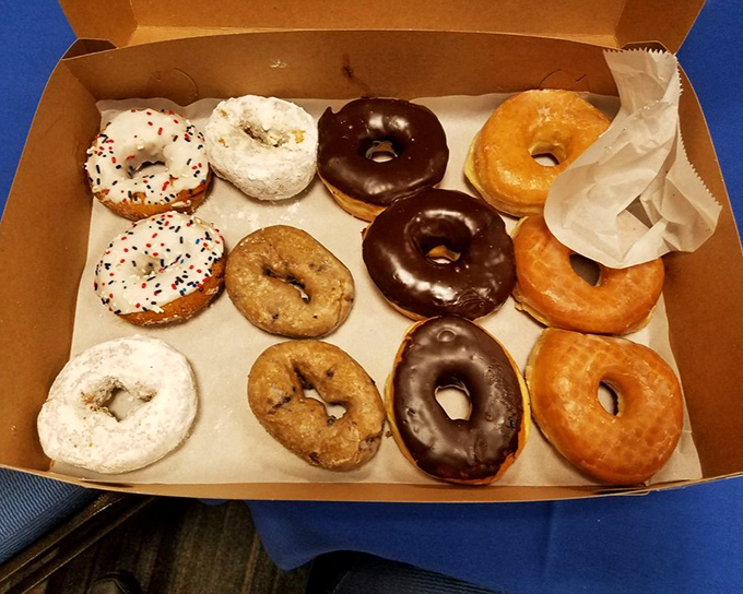 The donut box of dreams &ndash; a dozen reasons why pants with elastic waistbands were invented. Worth every glorious calorie.