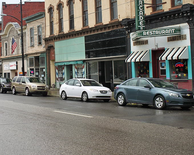 The Rocket Restaurant's vintage sign stands as a beacon of hope for hungry travelers, promising comfort food that predates the concept of kale smoothies.