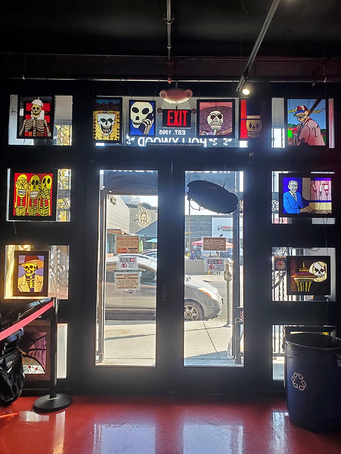 Even the exit reminds you that death is everywhere, surrounded by colorful artwork that somehow makes mortality approachable. 