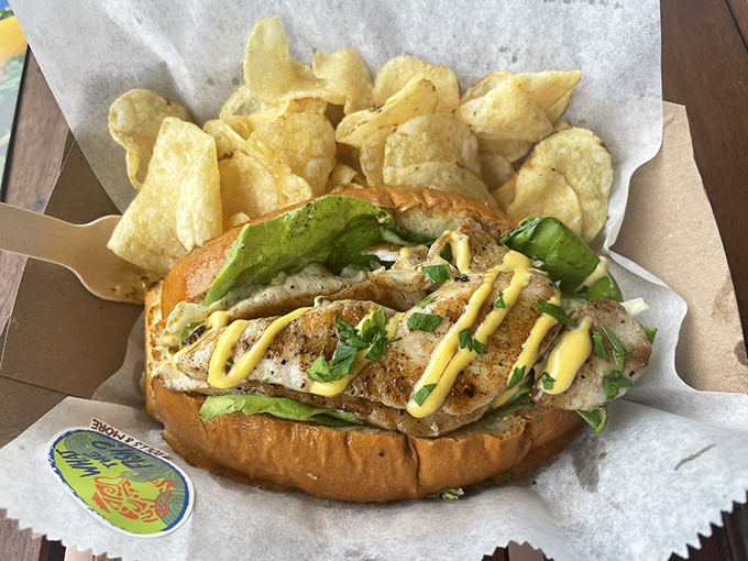 This isn't just a fish sandwich&mdash;it's edible architecture where every layer plays its part perfectly in the seafood symphony.