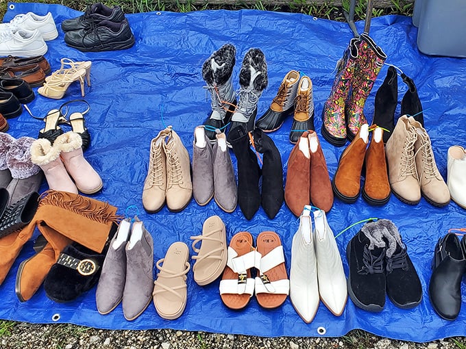 A rainbow of footwear possibilities spread across blue tarp&mdash;like Cinderella's closet, if Cinderella had excellent taste and bargain-hunting skills.