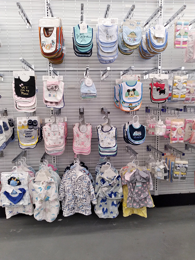 Baby bibs that say everything parents are thinking, displayed with military precision. Mickey Mouse meets practical parenting at prices that won't cause tantrums.