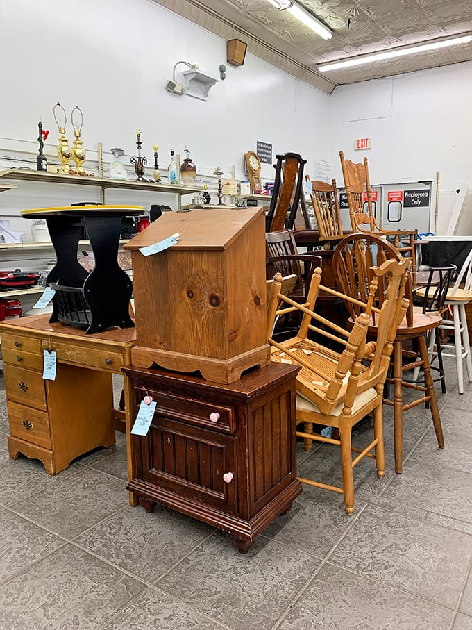 A wooden chair convention where every piece tells a different story. This furniture section is where mid-century modern meets Victorian in unexpected harmony.