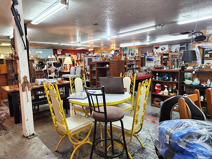 Mid-century meets modern in this furniture tableau. That yellow dining set has hosted more family stories than a Thanksgiving reunion.