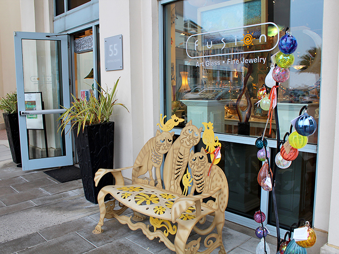 Not your average park bench! This whimsical cat-themed seat outside Fusion Art Glass proves Seaside takes even its sidewalk furniture seriously.